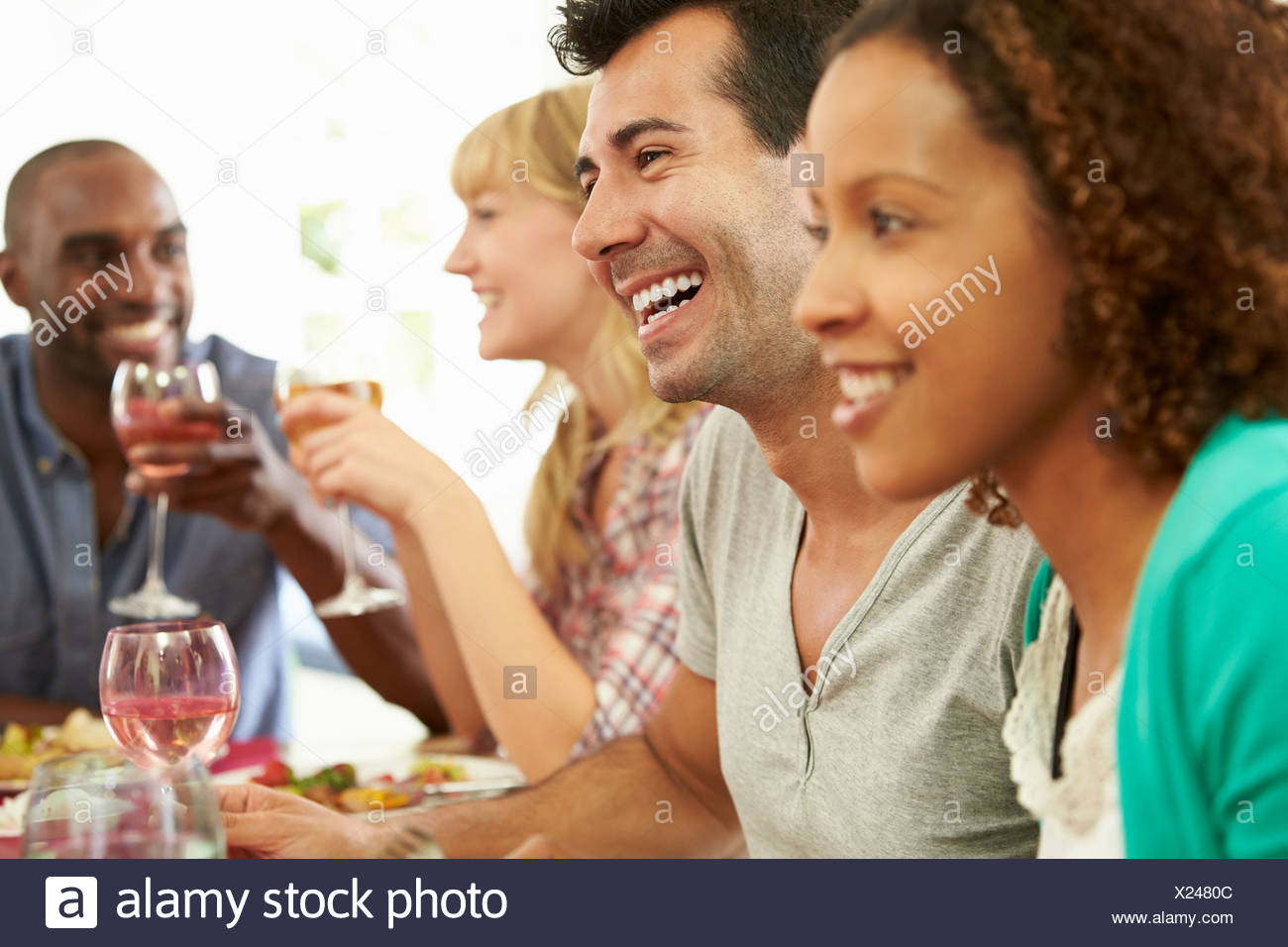 Women Sitting Around Kitchen Table Stock Photos & Women Sitting Around ...