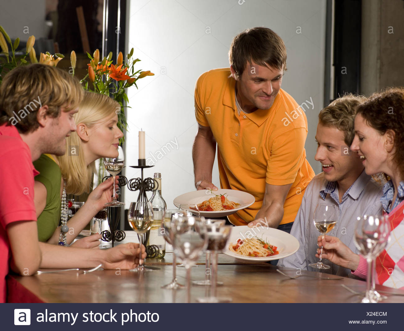 Side View Men Sitting Dining Stock Photos & Side View Men Sitting ...