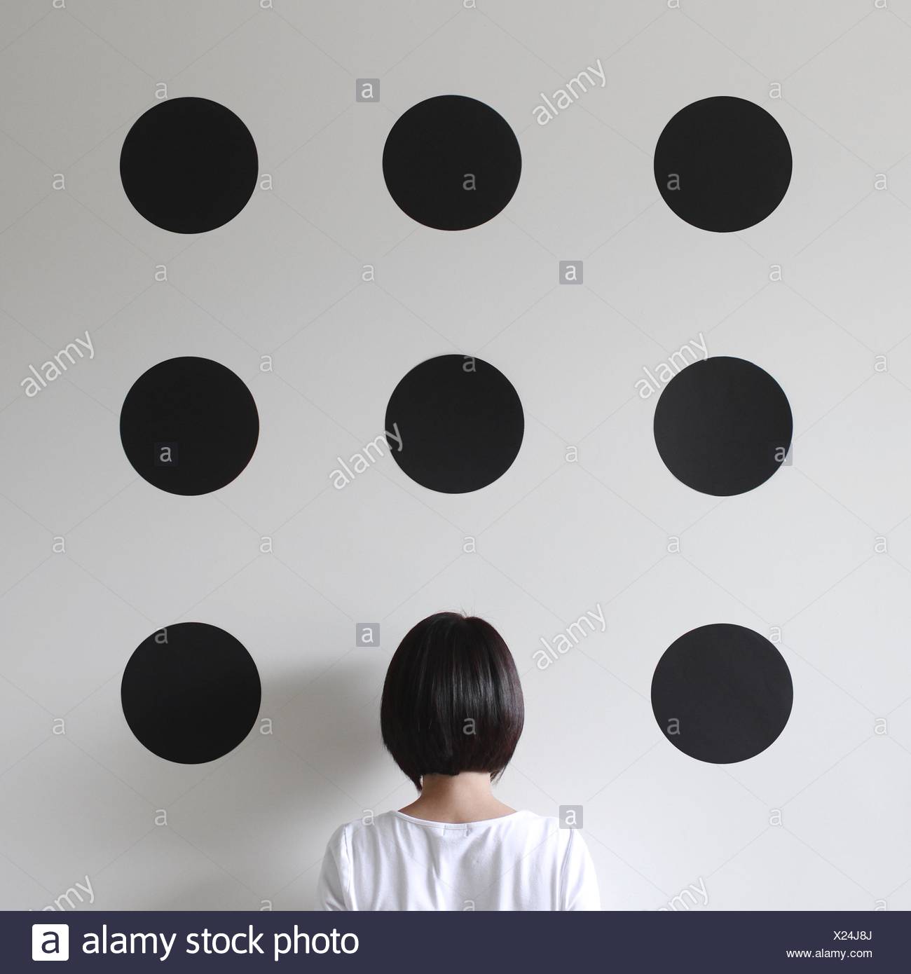 Woman Facing High Resolution Stock Photography and Images - Alamy