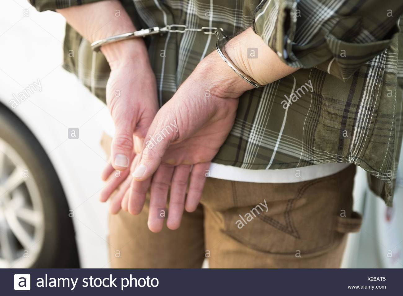 Man Handcuffs High Resolution Stock Photography and Images - Alamy