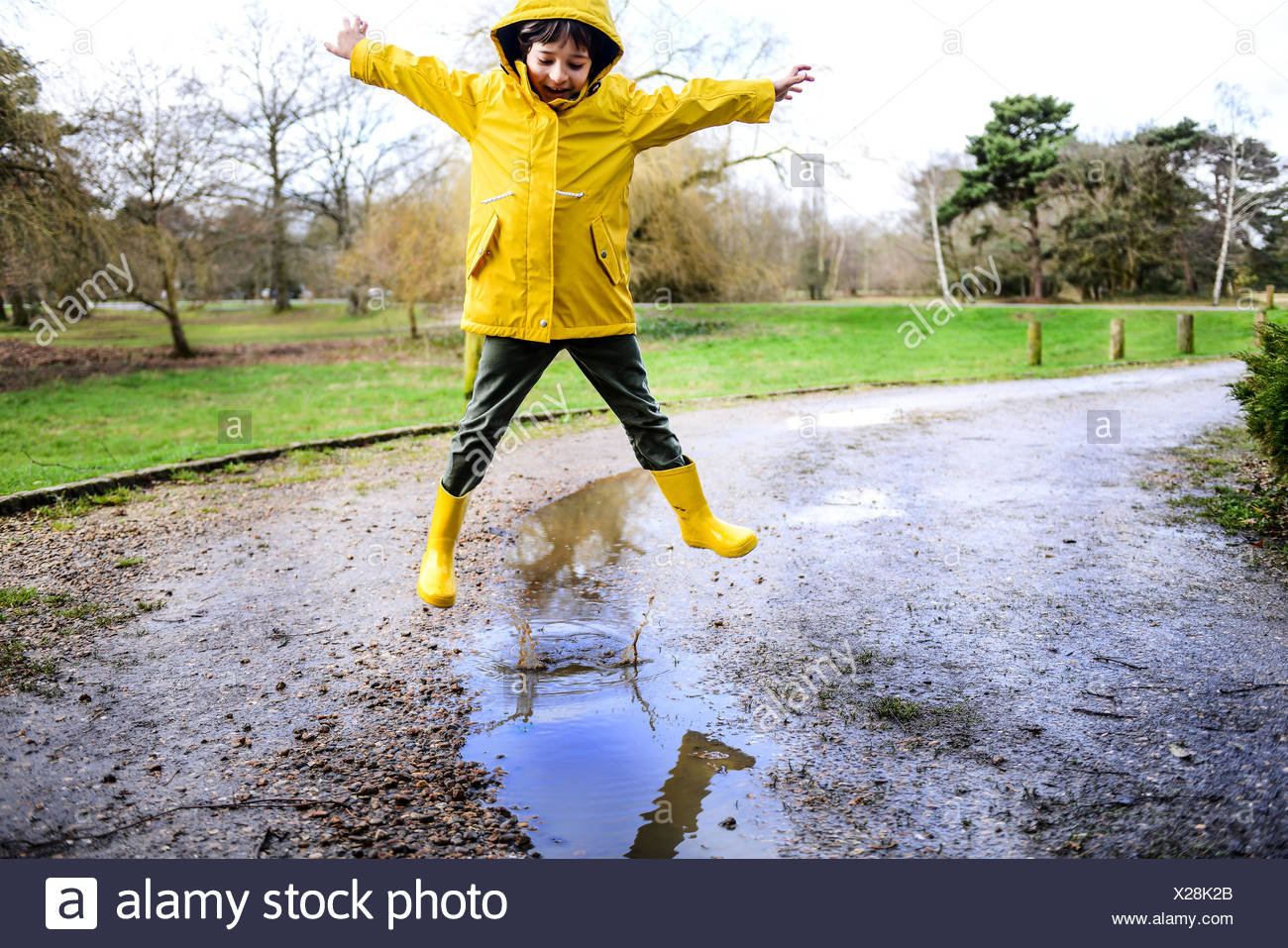 Boy In Puddle High Resolution Stock Photography and Images - Alamy