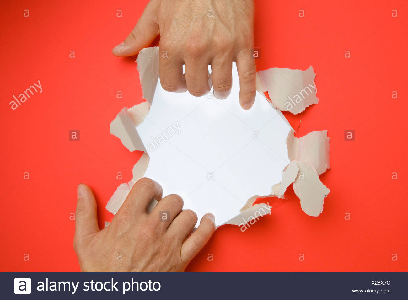 Hands Breaking Through Wall Stock Photos & Hands Breaking Through Wall ...