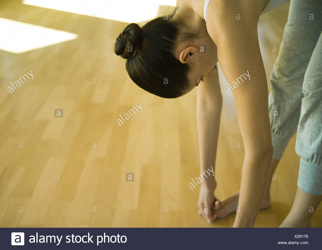 Woman Bending Over Touching Toes High Resolution Stock Photography and ...