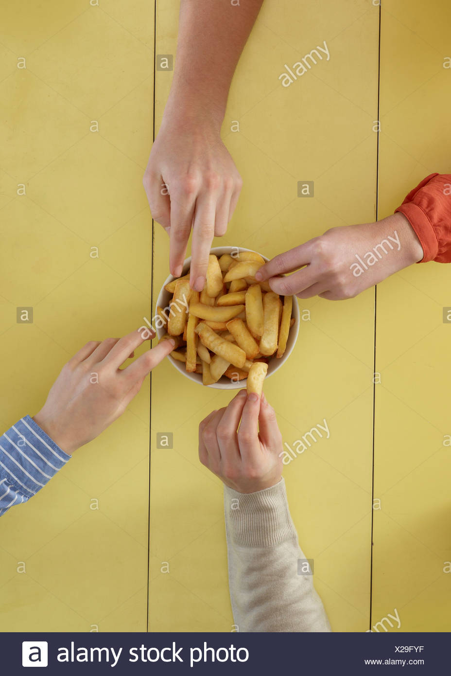 French Fries Hand Food Female High Resolution Stock Photography and ...