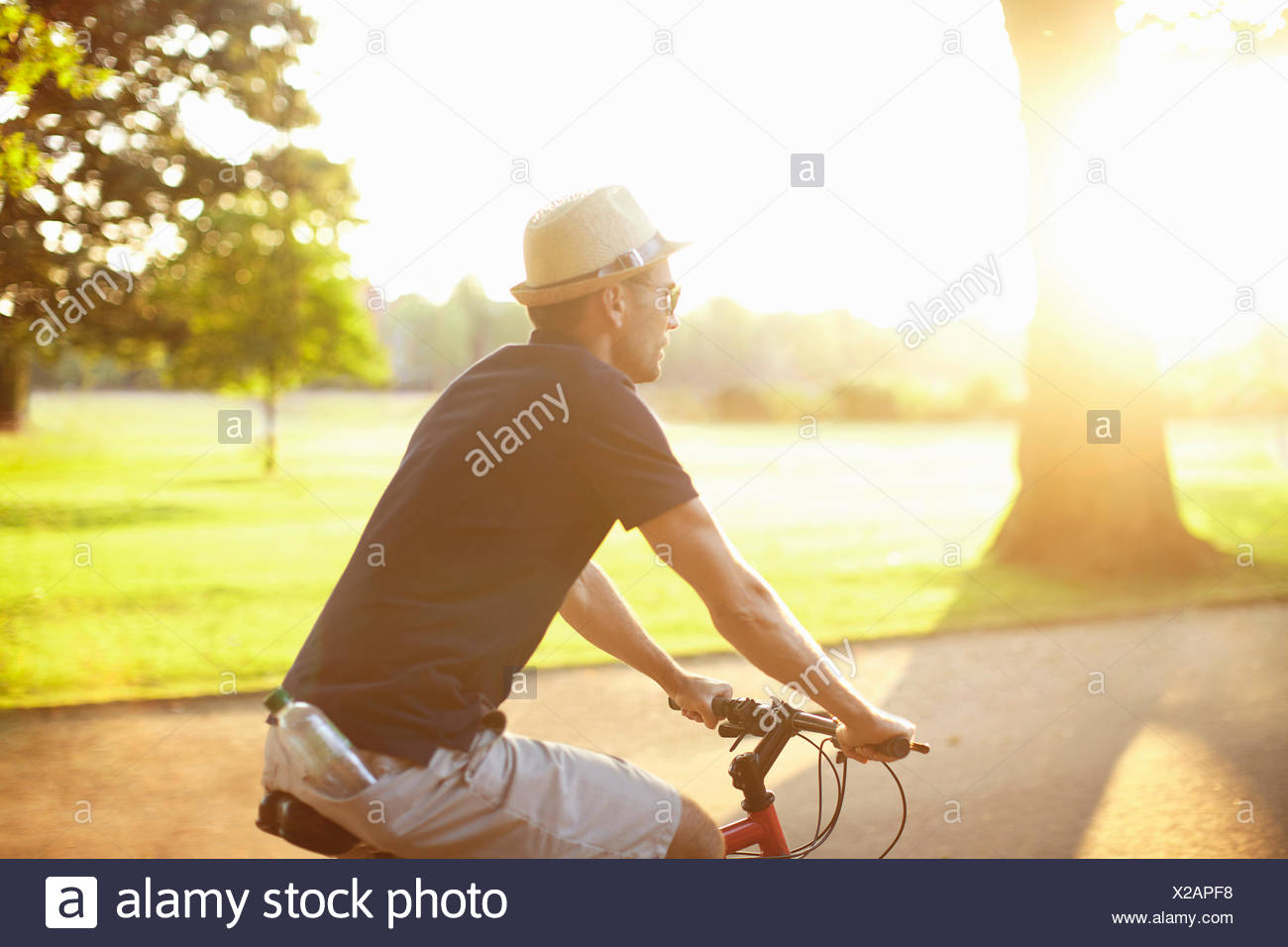 Mid Adult Man Riding Bicycle High Resolution Stock Photography and ...