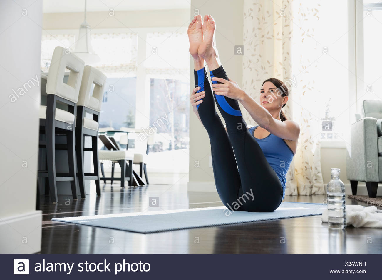 Woman Holding Her Legs Up In Air Stock Photos Woman Holding Her Legs Woman Holding Her Legs Up In Air Stock Photos Woman Holding Her Legs
