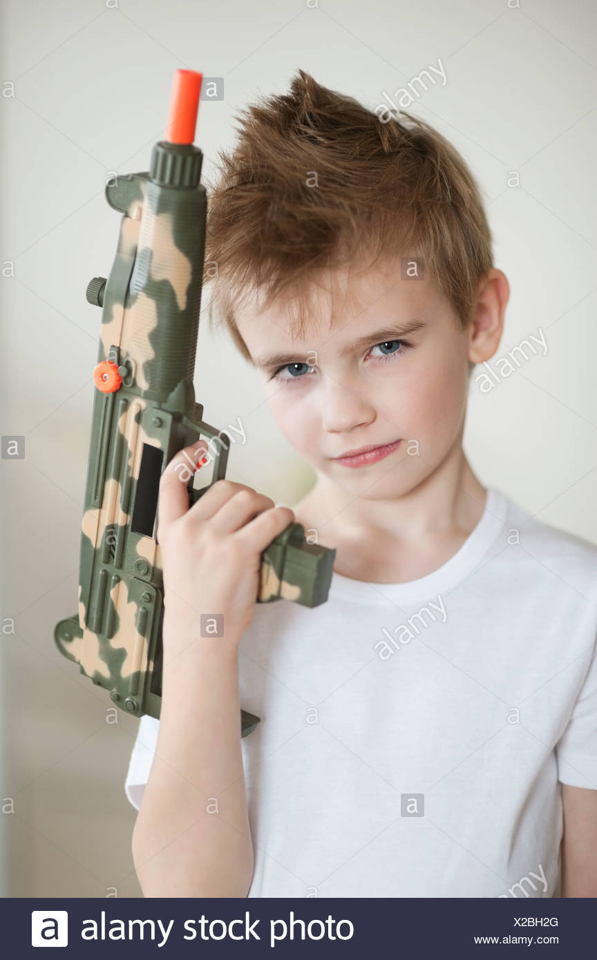 Boy With Gun High Resolution Stock Photography and Images - Alamy