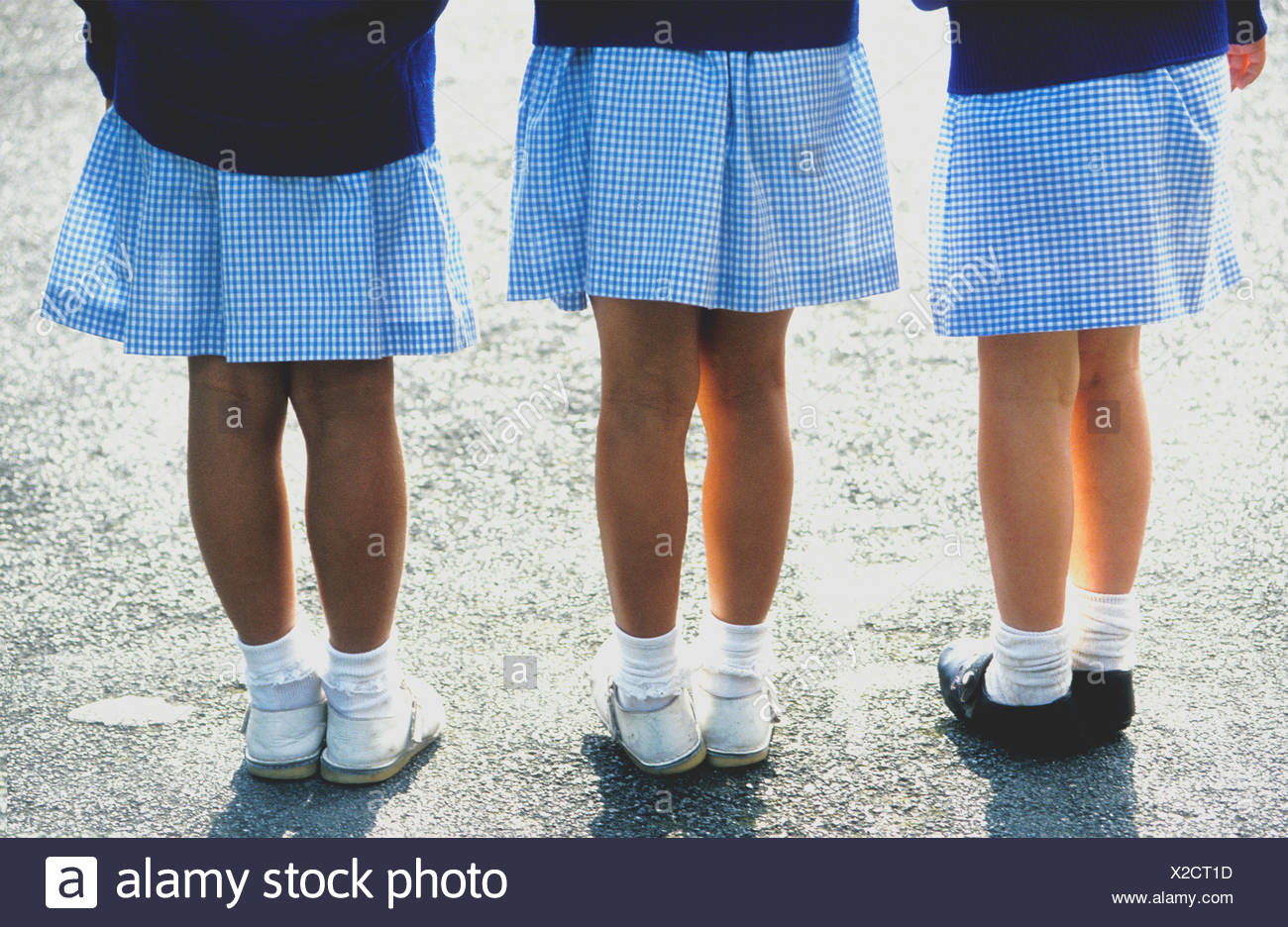 Three Girls School Uniform Legs Stock Photos & Three Girls School ...