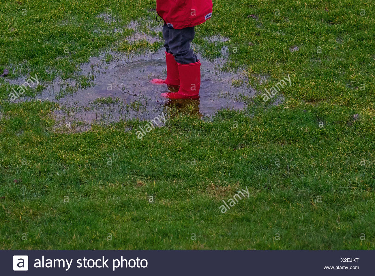 Boy In Puddle High Resolution Stock Photography and Images - Alamy