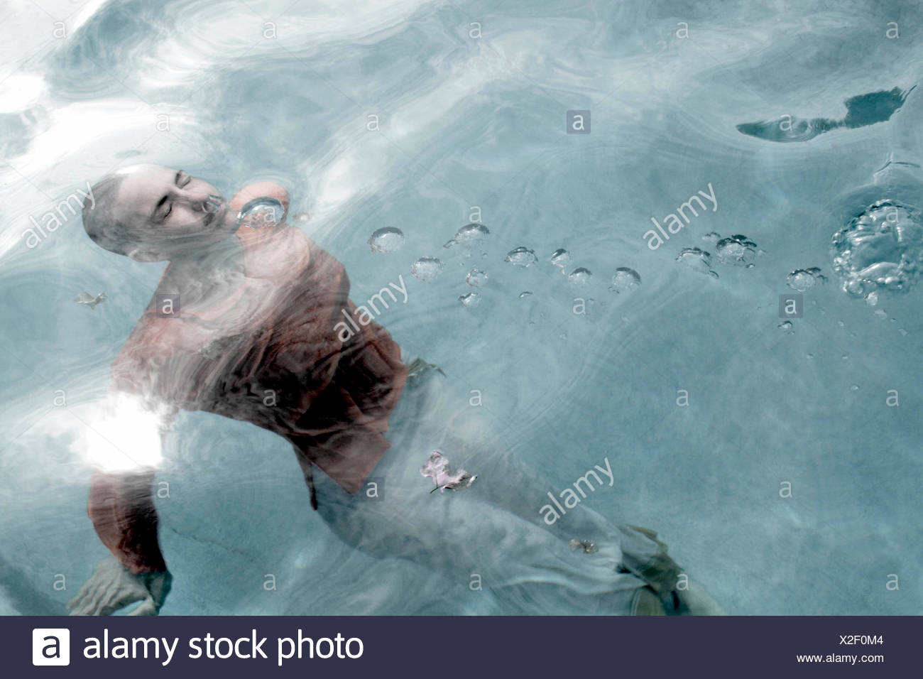 Woman Underwater Clothed High Resolution Stock Photography and Images - Alamy