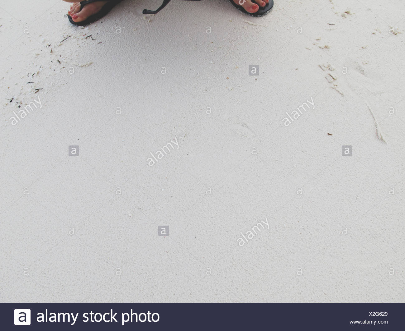 Feet In Flip Flops On Beach High Resolution Stock Photography and ...