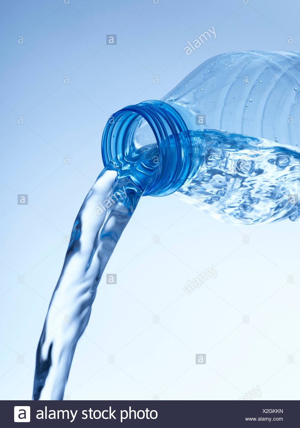 Liquid Pouring From Bottle Stock Photos & Liquid Pouring From Bottle ...