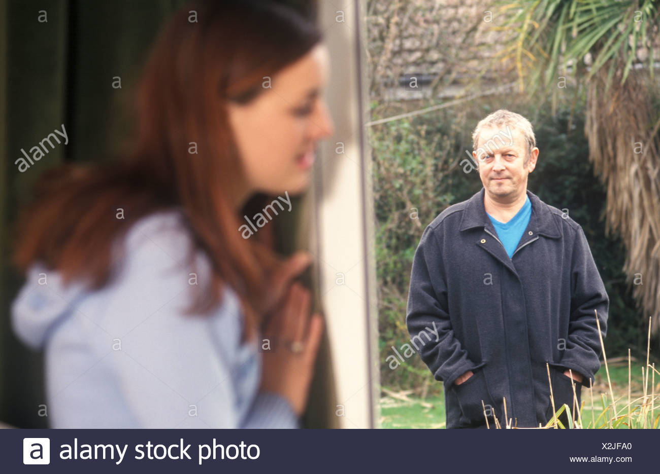 Man Stalking Girl High Resolution Stock Photography and Images - Alamy