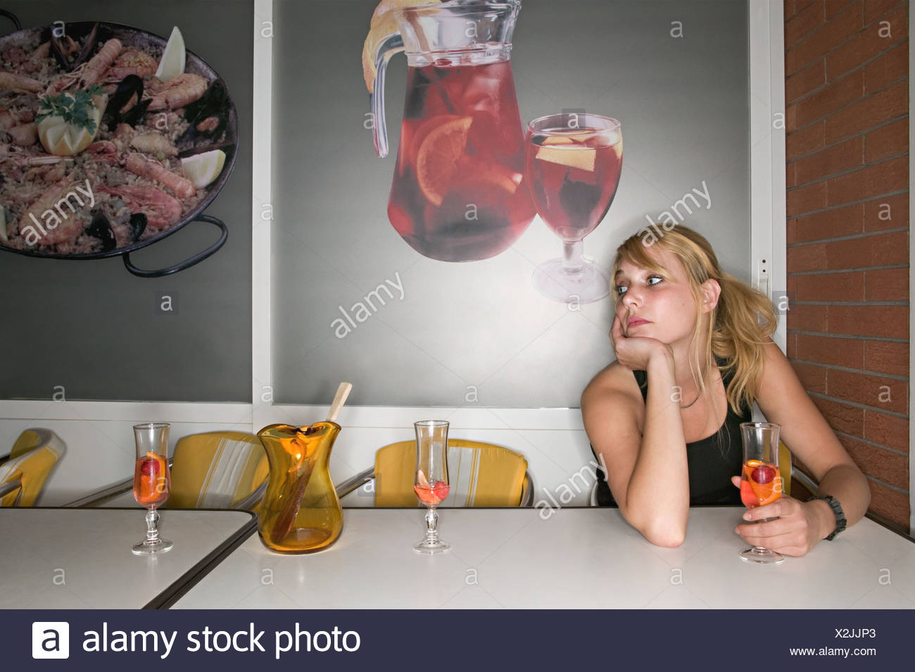 Lonely Woman In Bar High Resolution Stock Photography and Images - Alamy