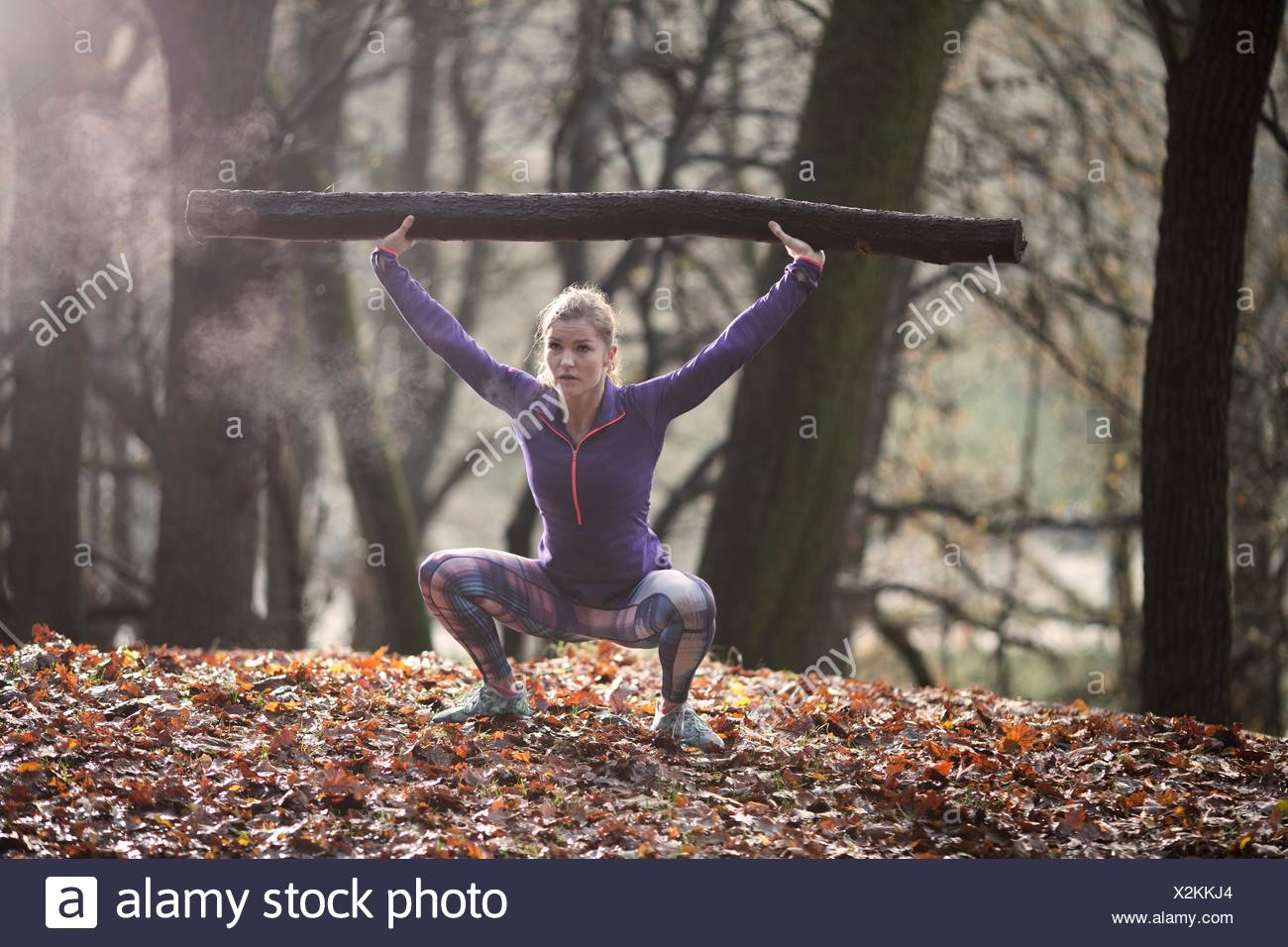 Girl Squatting High Resolution Stock Photography and Images - Alamy