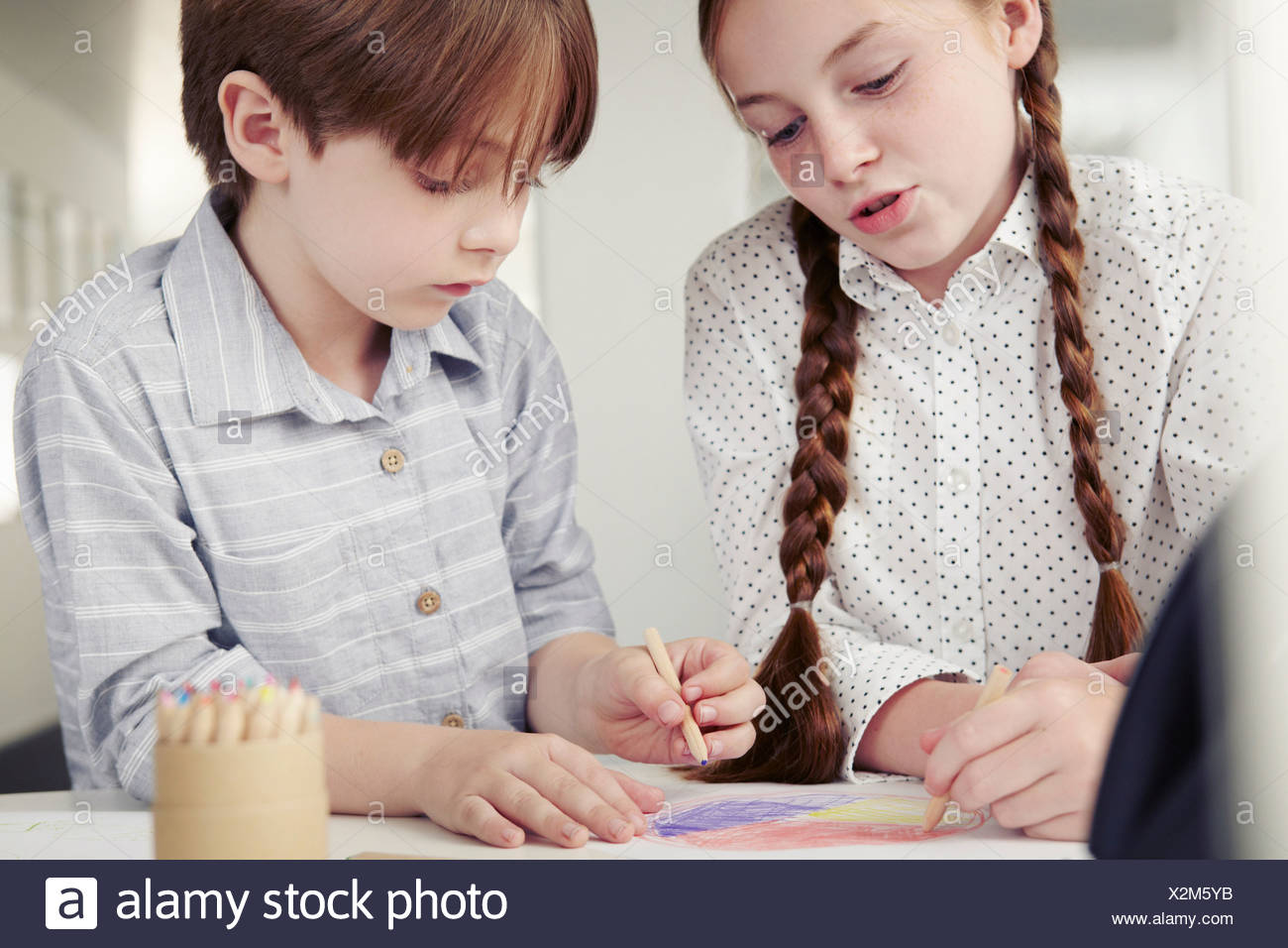 Boy And Girl Drawing High Resolution Stock Photography and Images - Alamy
