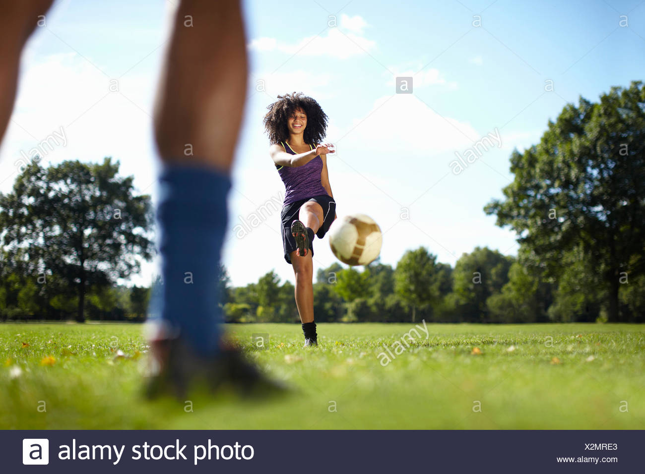 Girl Kicking Ball High Resolution Stock Photography and Images - Alamy