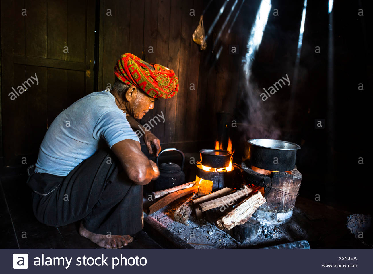 Elderly People By Fire High Resolution Stock Photography and Images - Alamy