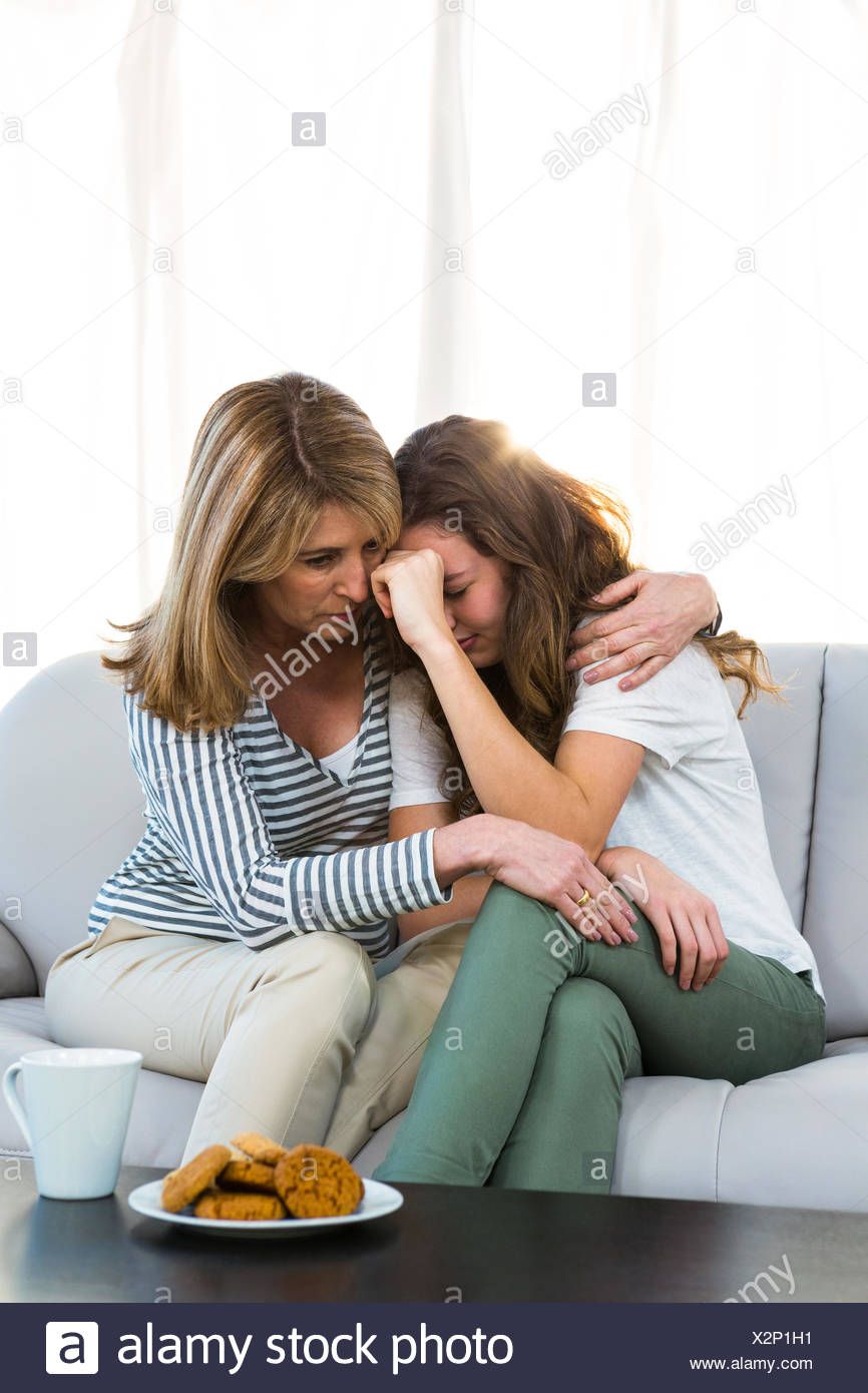 Mother Comforting Young Daughter High Resolution Stock Photography and Images - Alamy