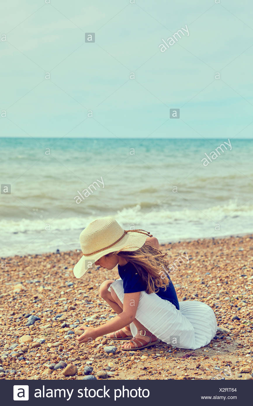 Girl Collecting Shells High Resolution Stock Photography and Images - Alamy