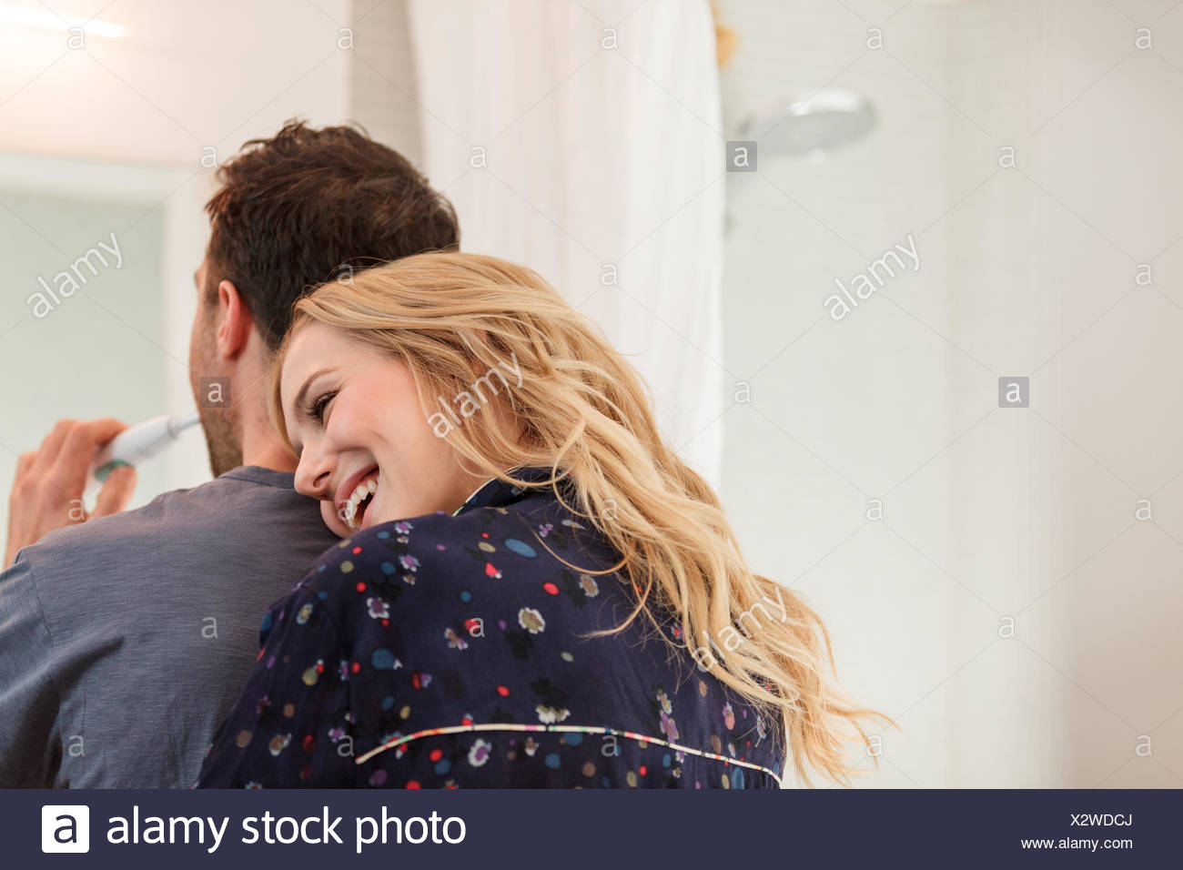 Couple Hugging In Bathroom High Resolution Stock Photography and Images ...