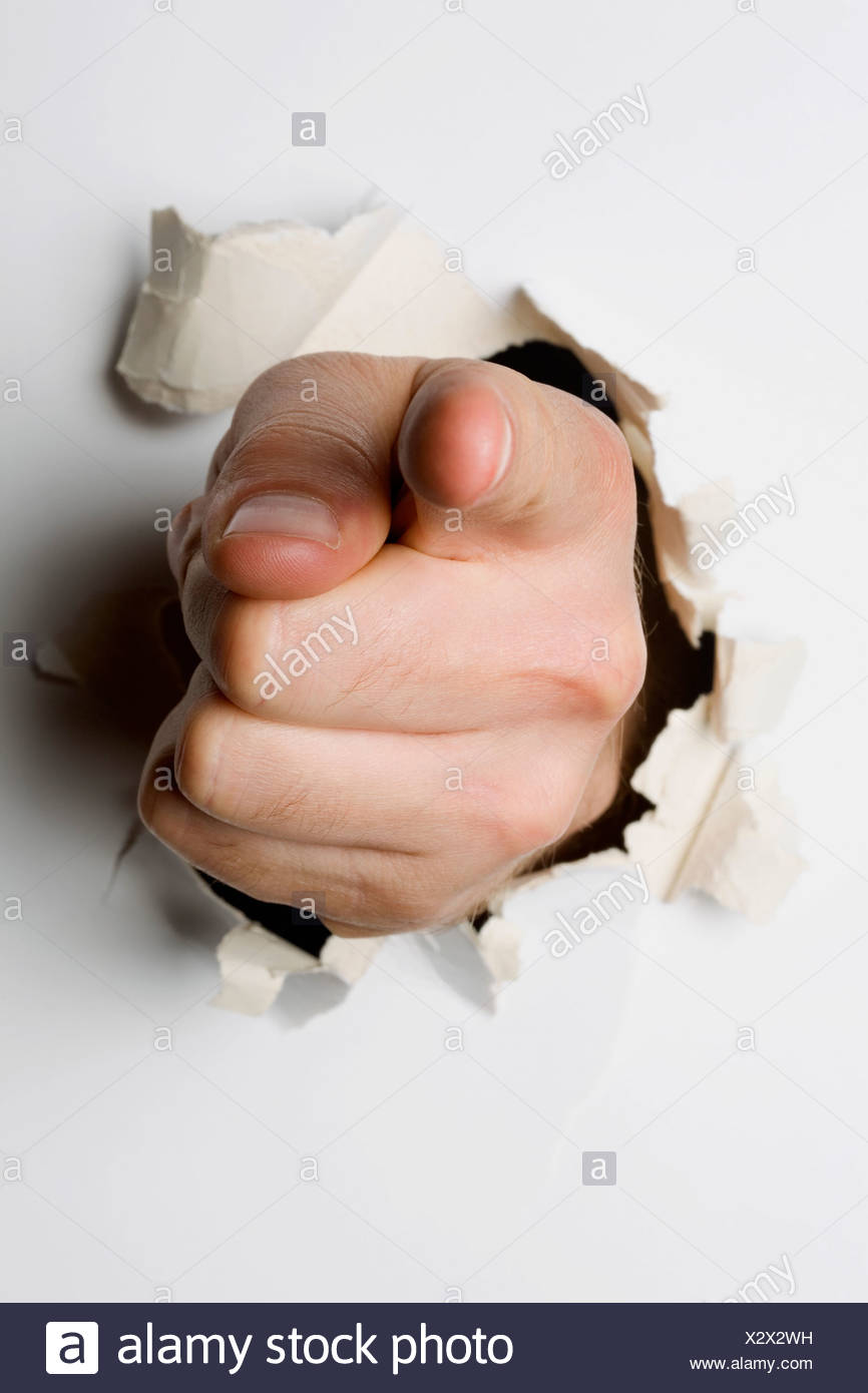 Fist Punching Through Wall High Resolution Stock Photography and Images ...