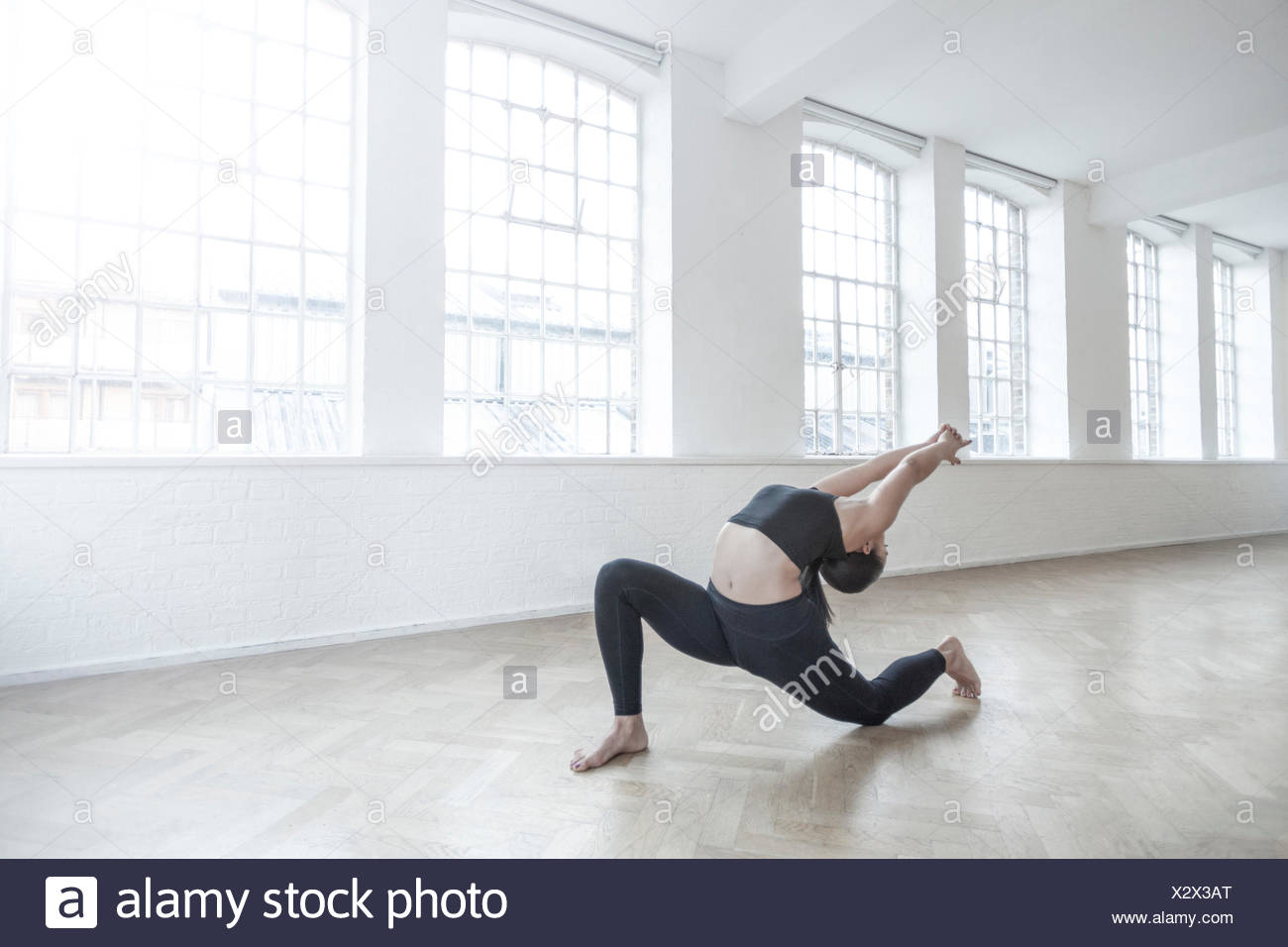 Young Woman Bending Over In High Resolution Stock Photography and ...
