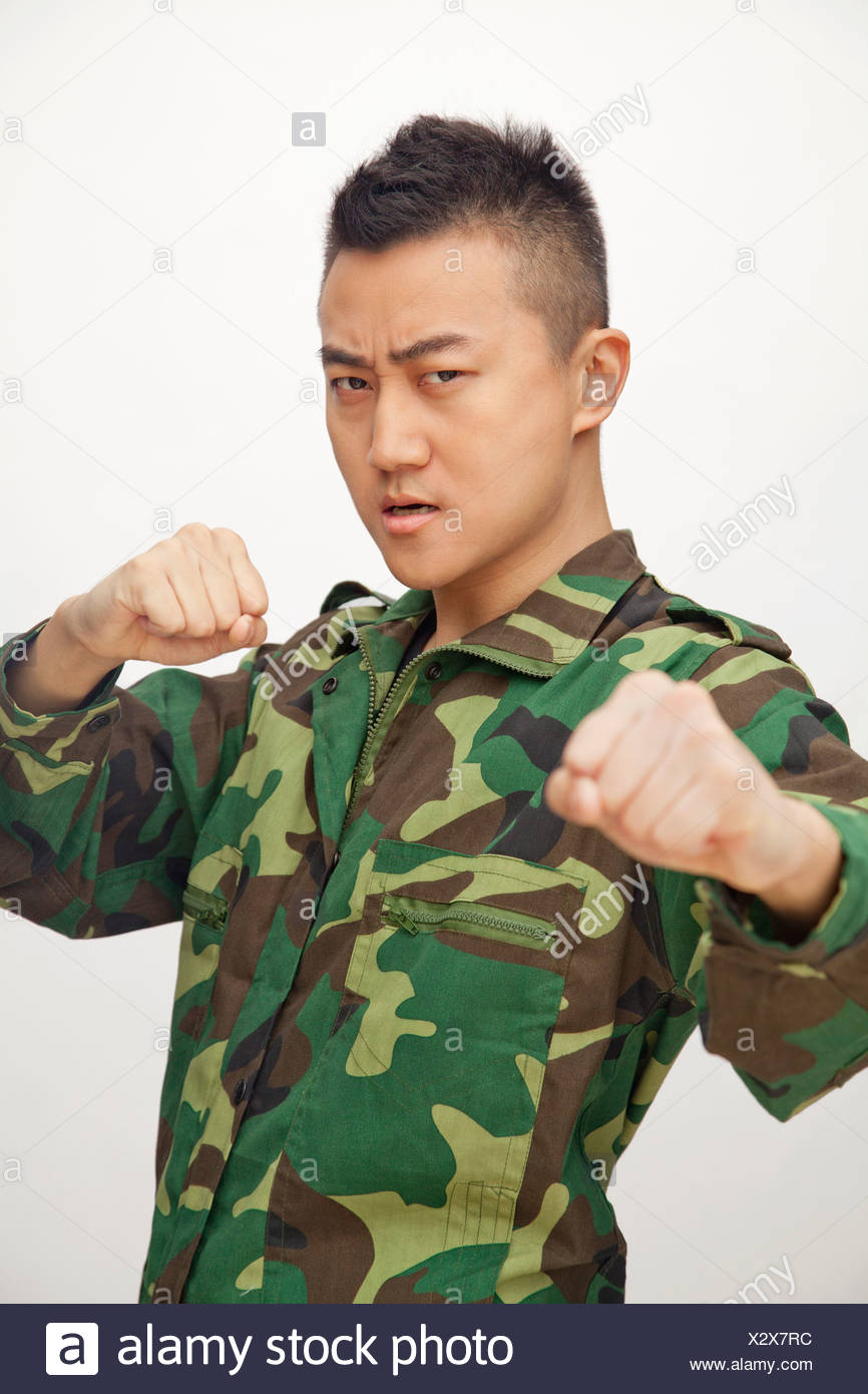 Young Chinese Men In Military High Resolution Stock Photography and ...