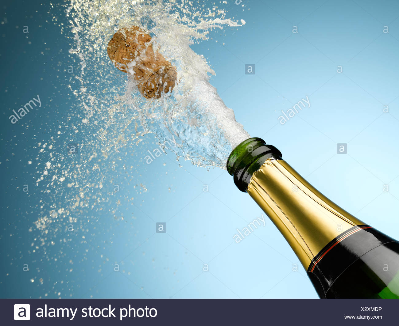 Champagne Bottle Exploding Stock Photos & Champagne Bottle Exploding ...