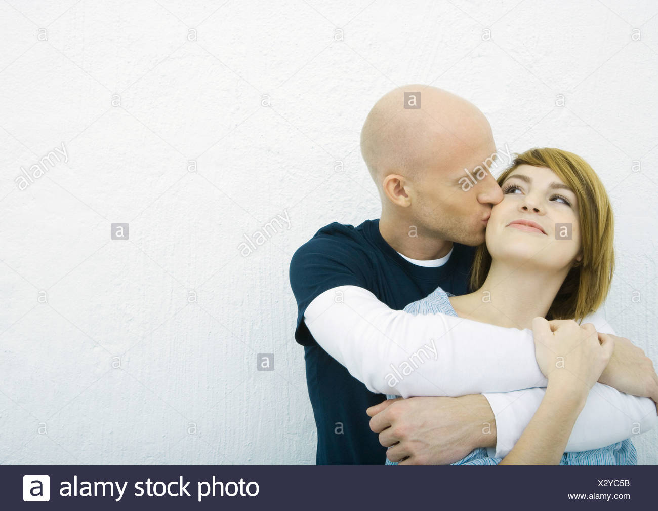 Man Kissing Woman From Behind High Resolution Stock Photography and ...