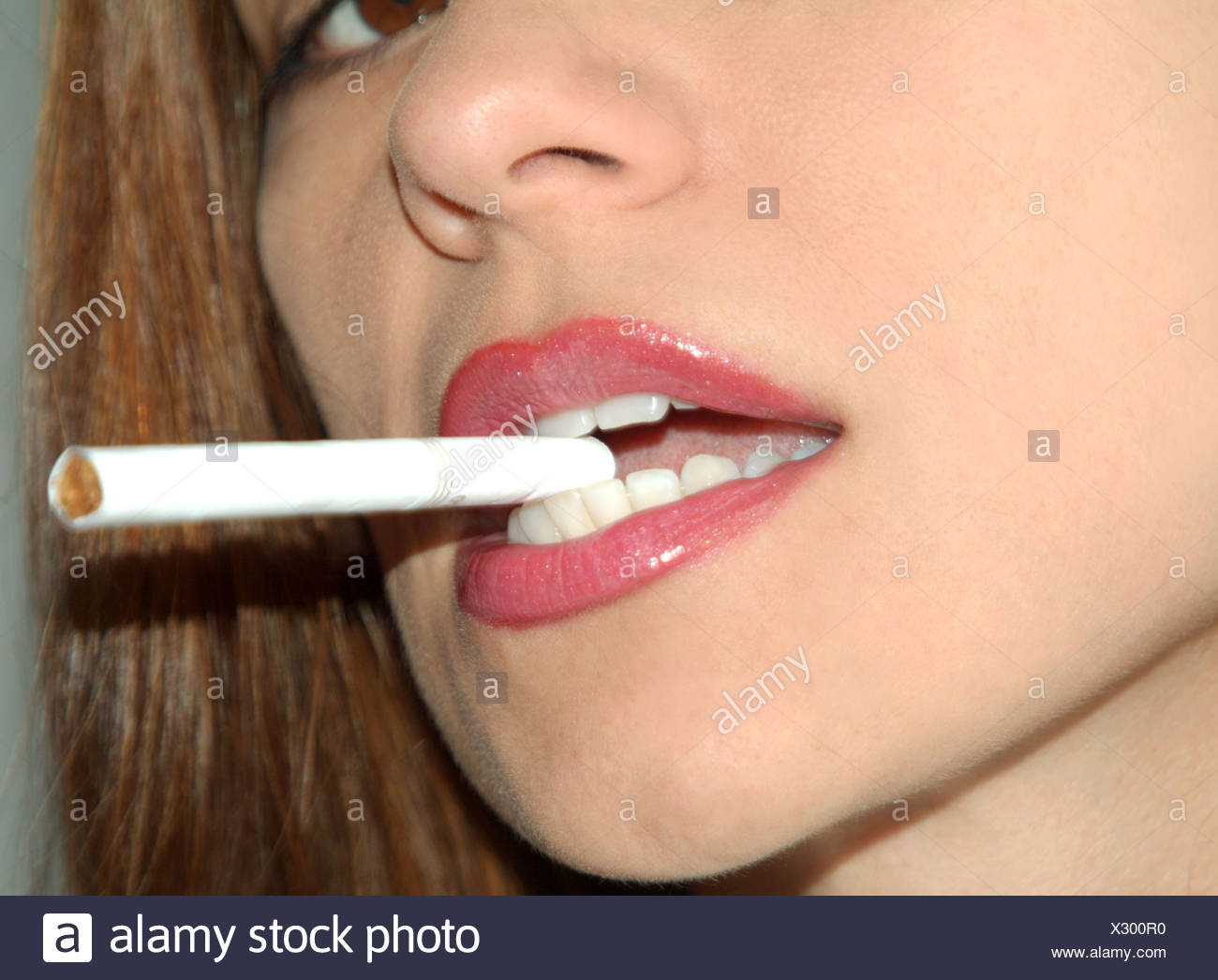 Unlit Cigarette In Mouth Stock Photos & Unlit Cigarette In Mouth Stock ...