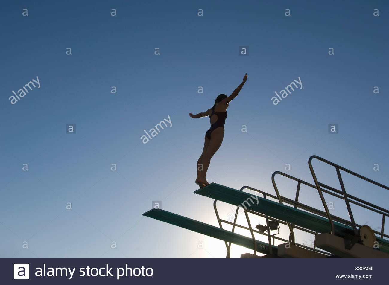 Female Swimmer Standing By Pool High Resolution Stock Photography and ...