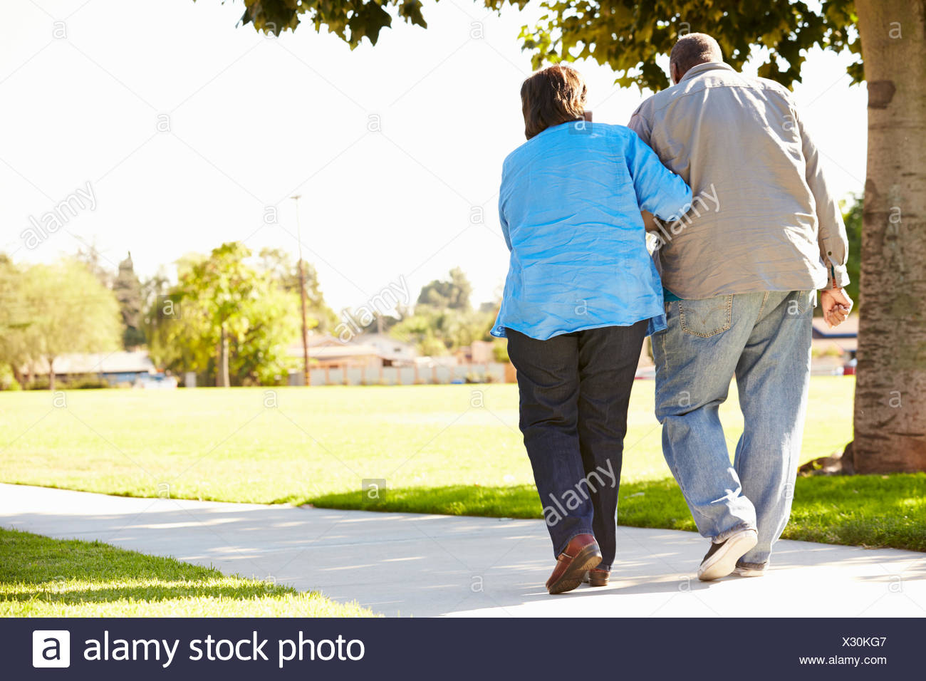 Carer Helping Senior Woman Walk High Resolution Stock Photography and ...