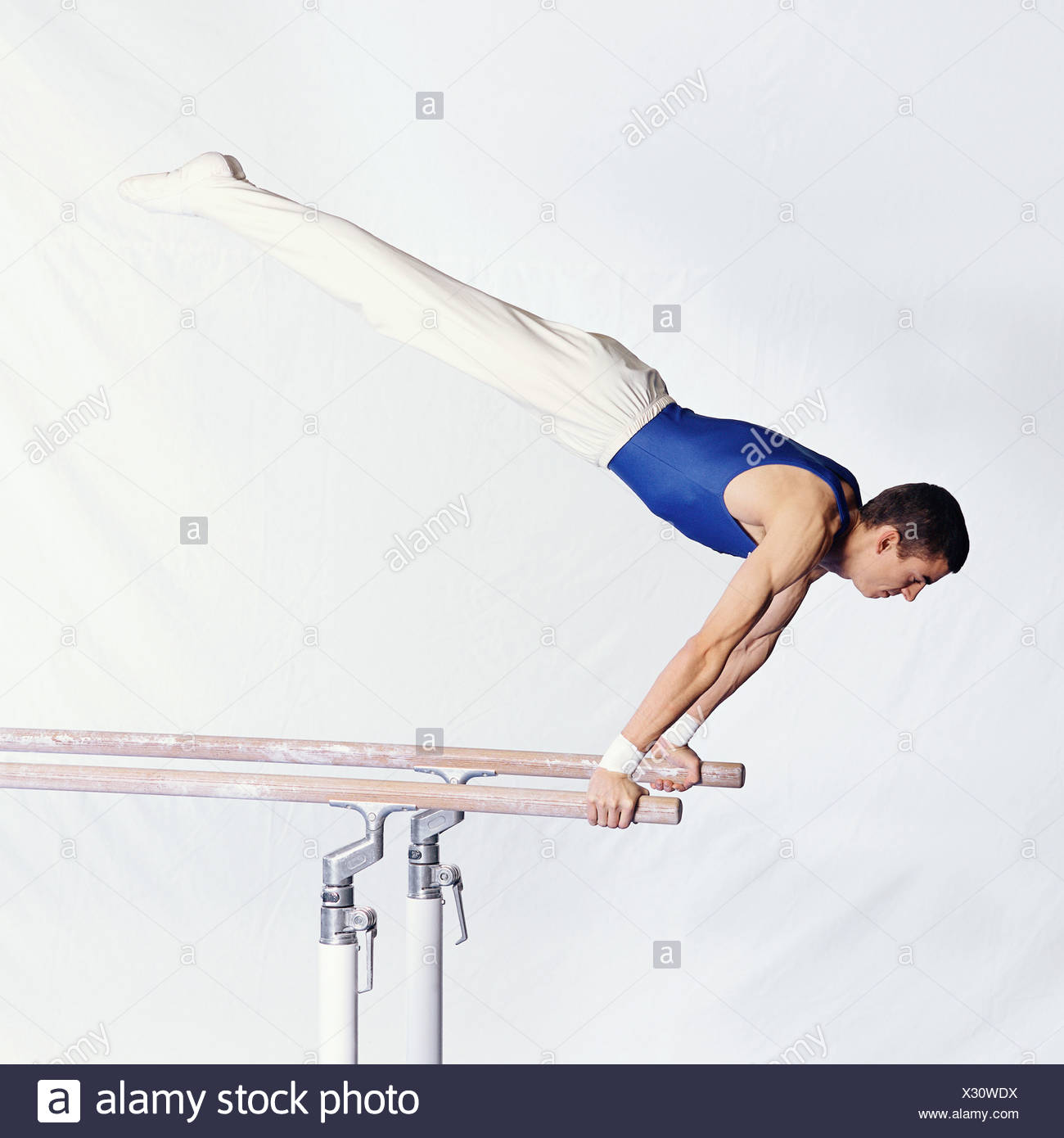 Gymnast On Parallel Bars Stock Photos & Gymnast On Parallel Bars Stock ...