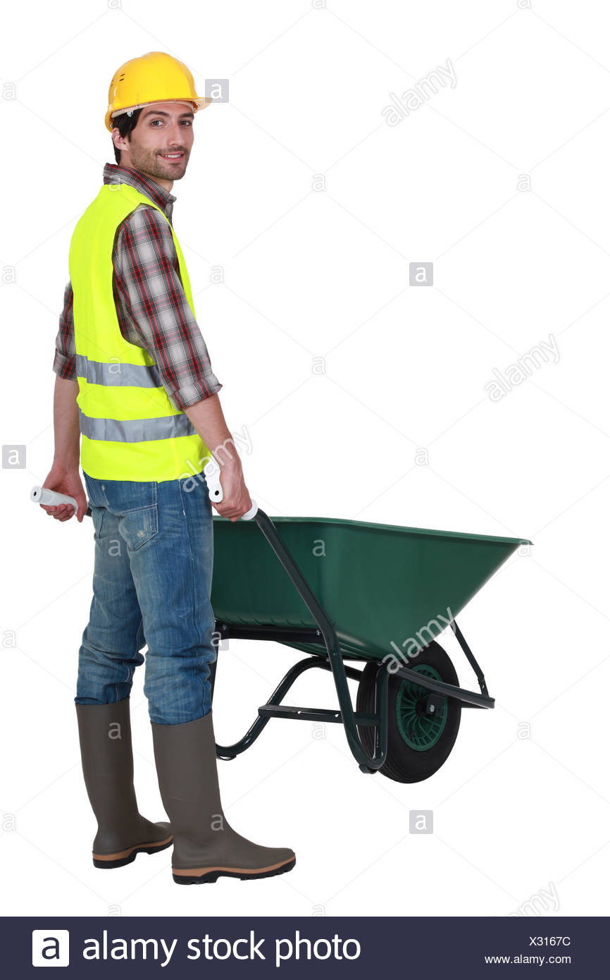 Man Hauling Barrow Stock Photos & Man Hauling Barrow Stock Images - Alamy