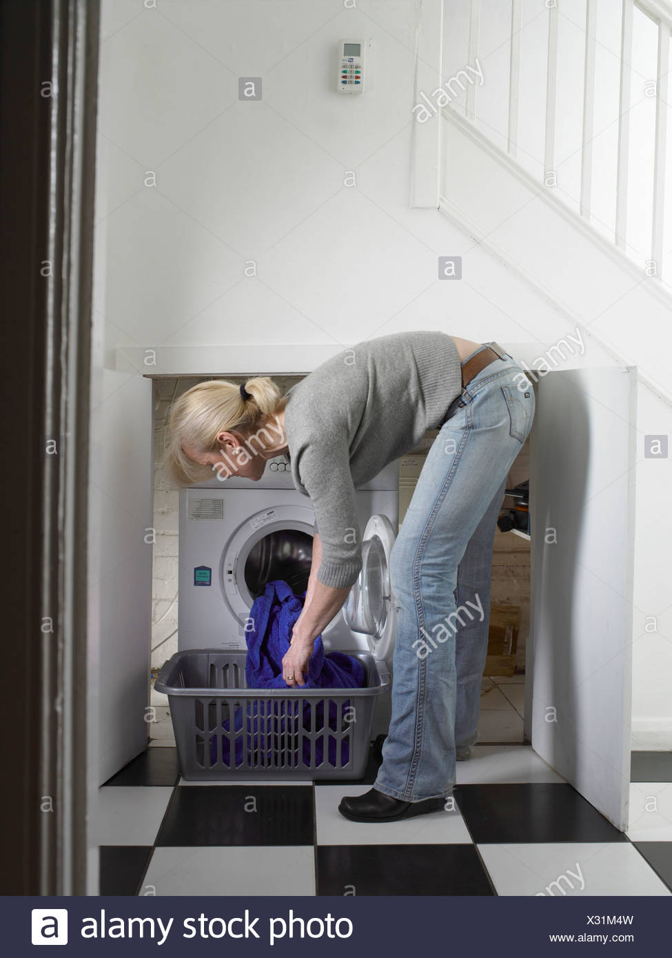 Woman Removing Clothes High Resolution Stock Photography and Images - Alamy