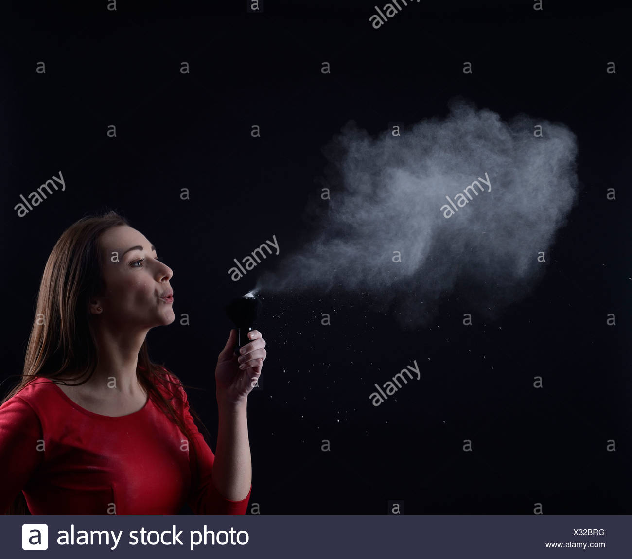 Blowing Powder Stock Photos & Blowing Powder Stock Images - Alamy