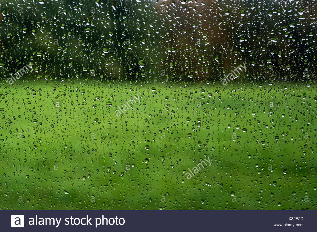 Looking Out Window Rain Stock Photos & Looking Out Window Rain Stock ...