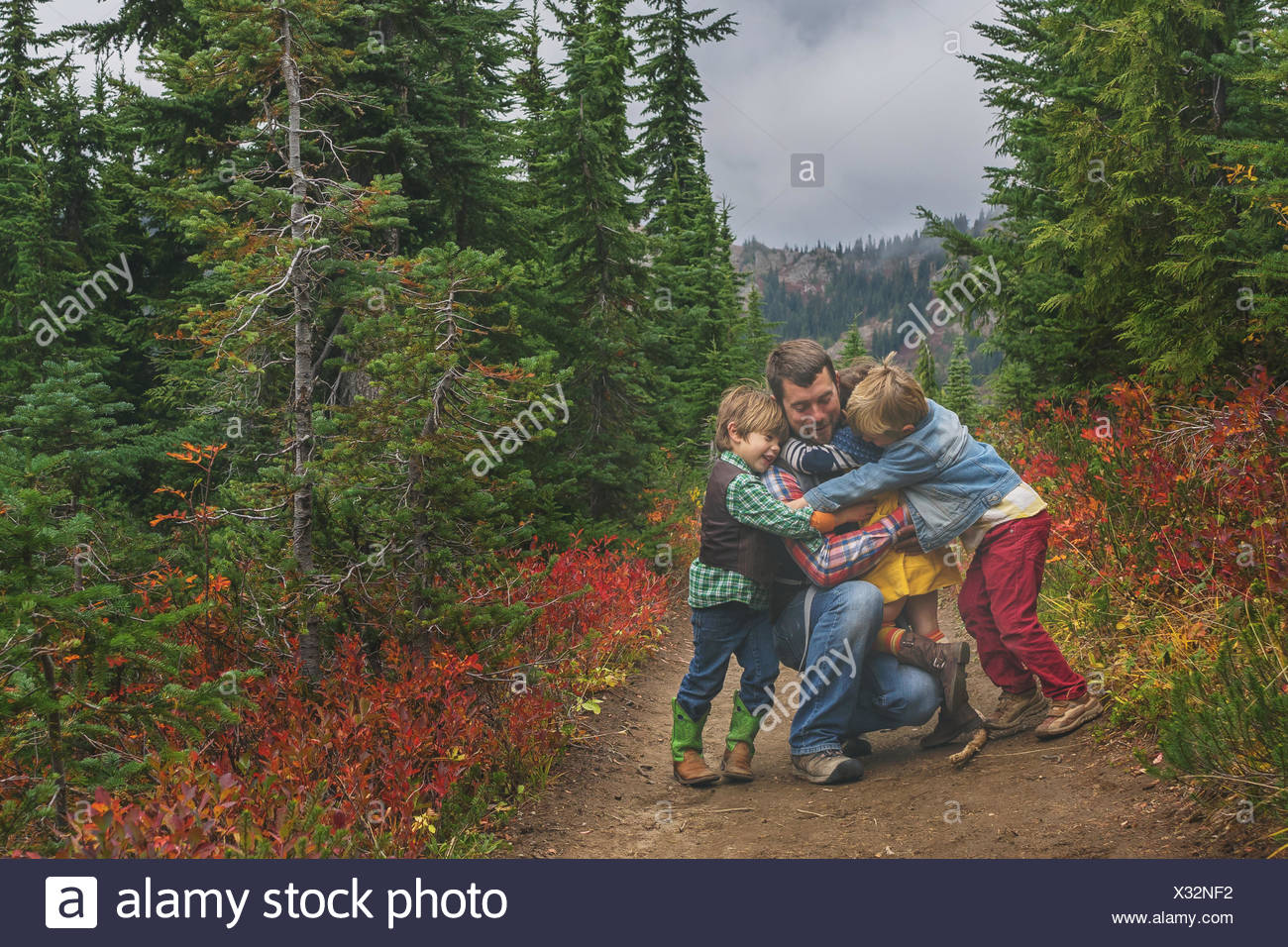 Boy Hugging Father High Resolution Stock Photography and Images - Alamy