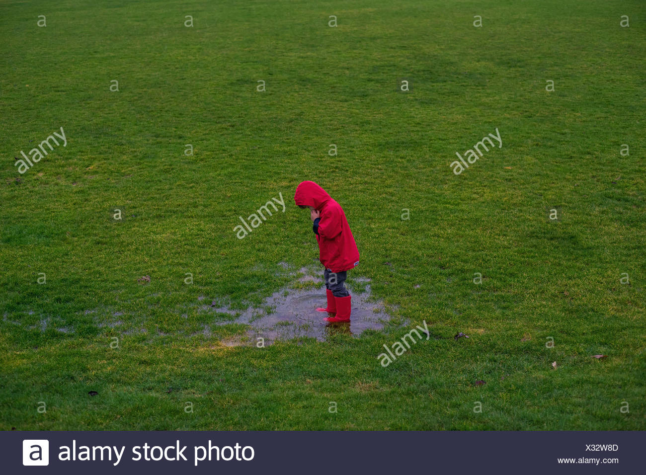Boy In Puddle High Resolution Stock Photography and Images - Alamy