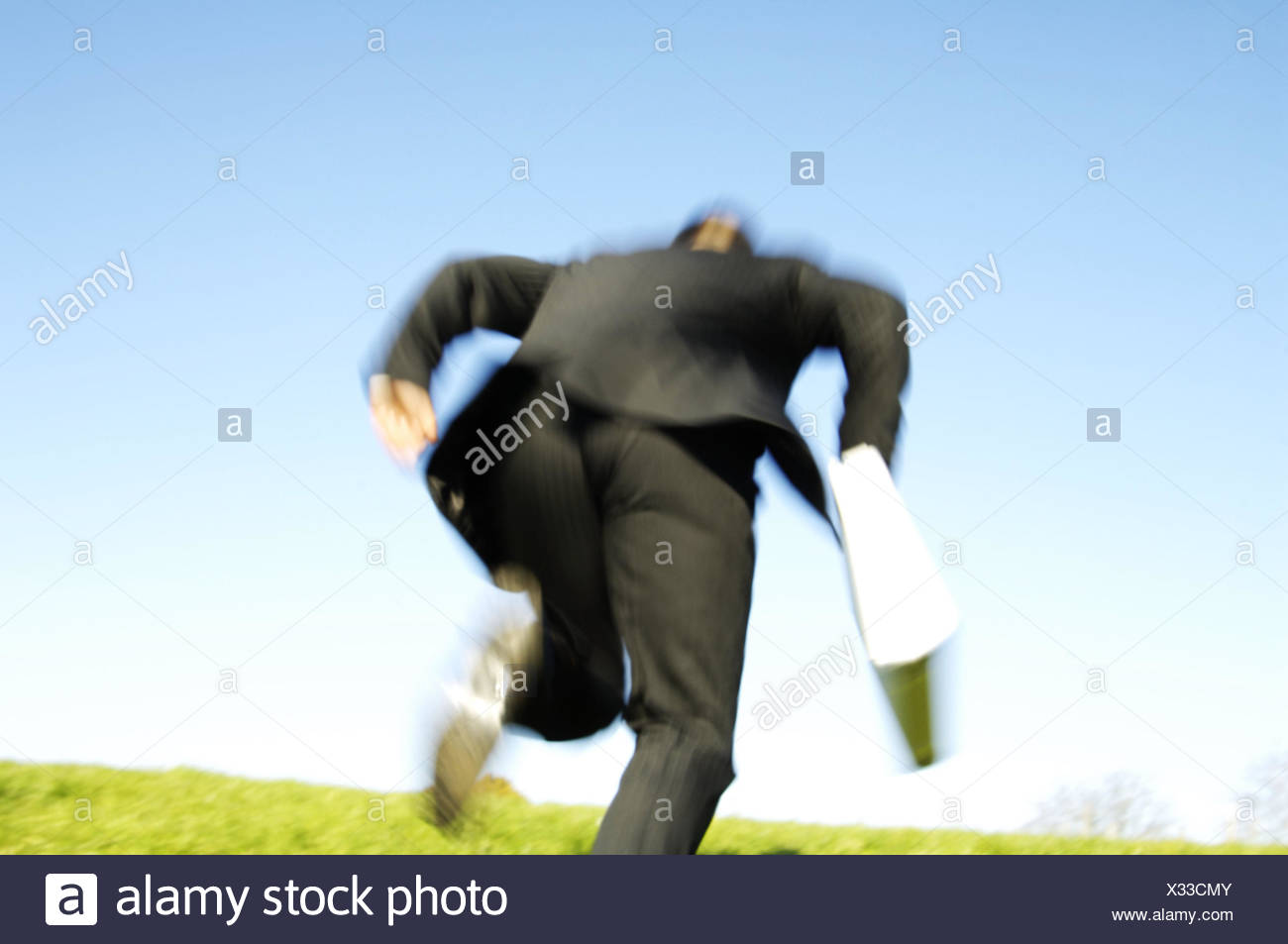 Man Running Back Suit High Resolution Stock Photography and Images - Alamy