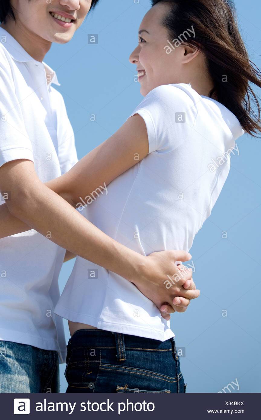 Arms Around Waist High Resolution Stock Photography and Images - Alamy