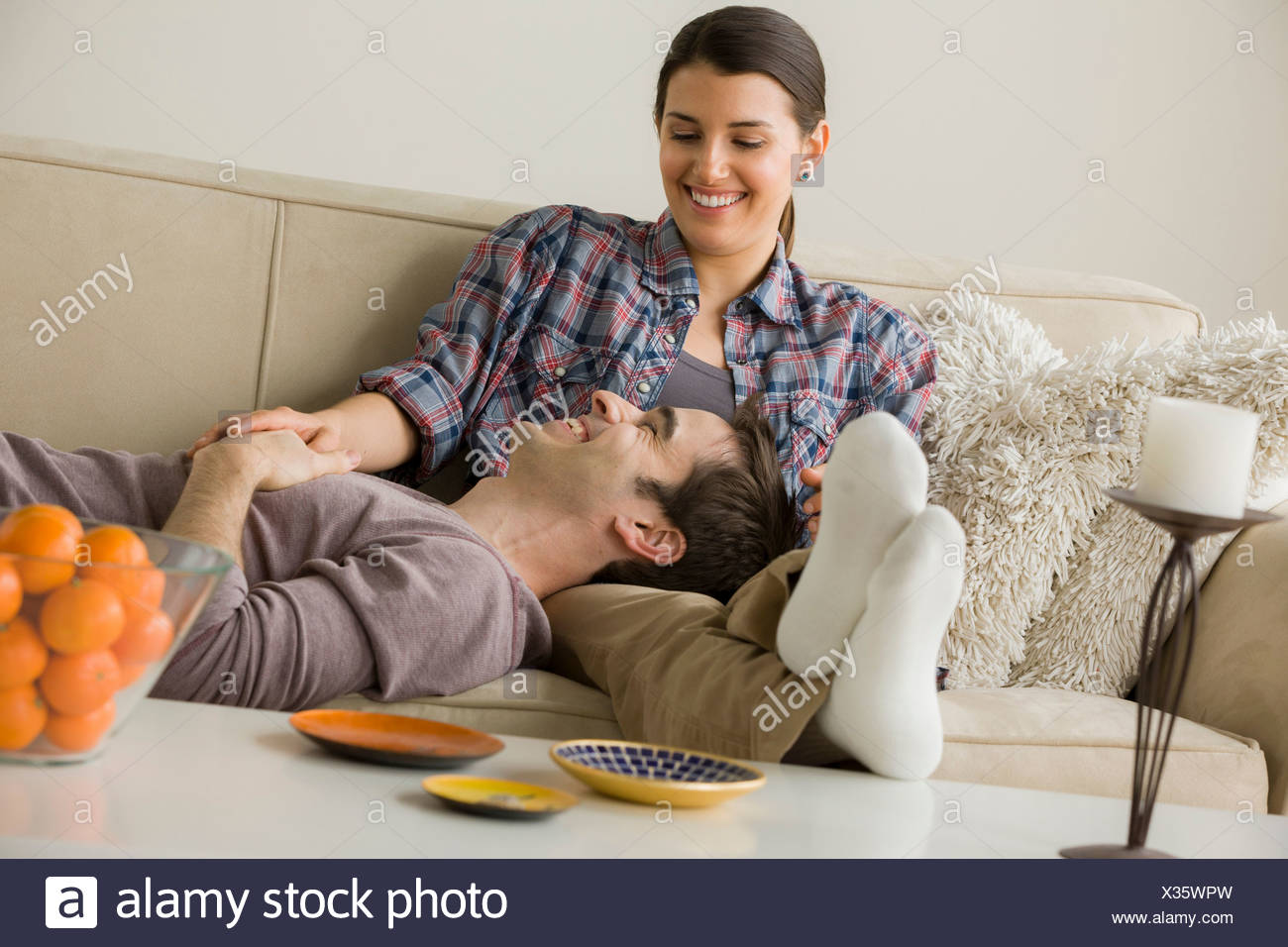 Man With Head On Womans Lap High Resolution Stock Photography and ...