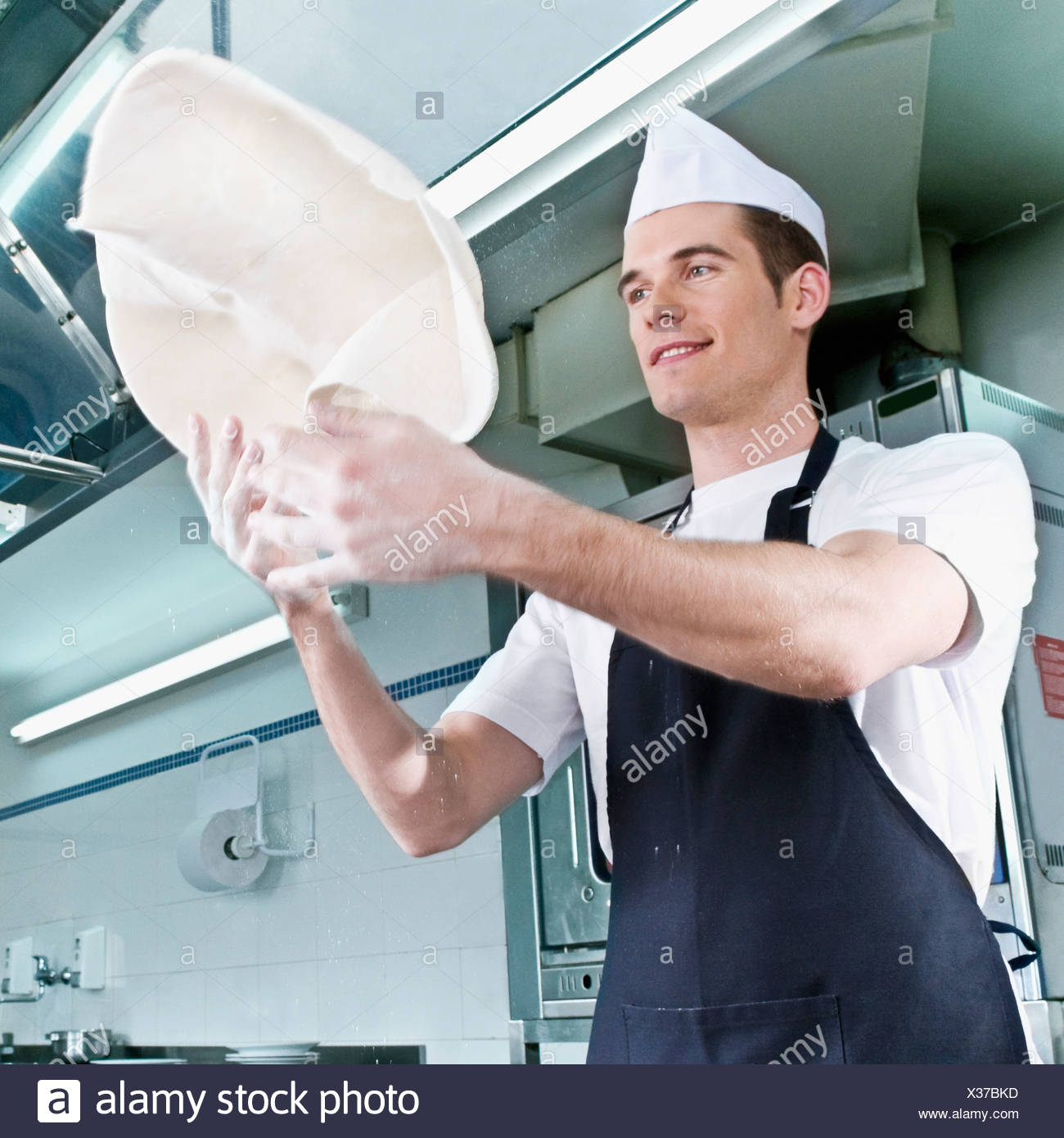 Chef Throwing Food Stock Photos & Chef Throwing Food Stock Images - Alamy