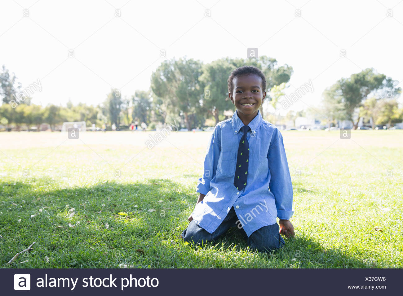 Child Kneeling Stock Photos & Child Kneeling Stock Images - Alamy