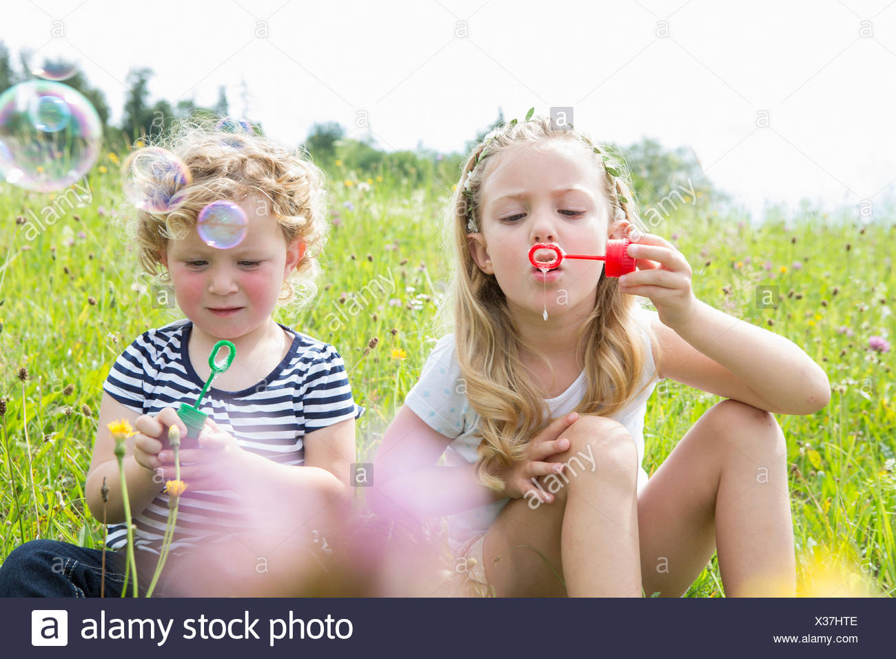 Children Blowing Bubbles High Resolution Stock Photography and Images ...