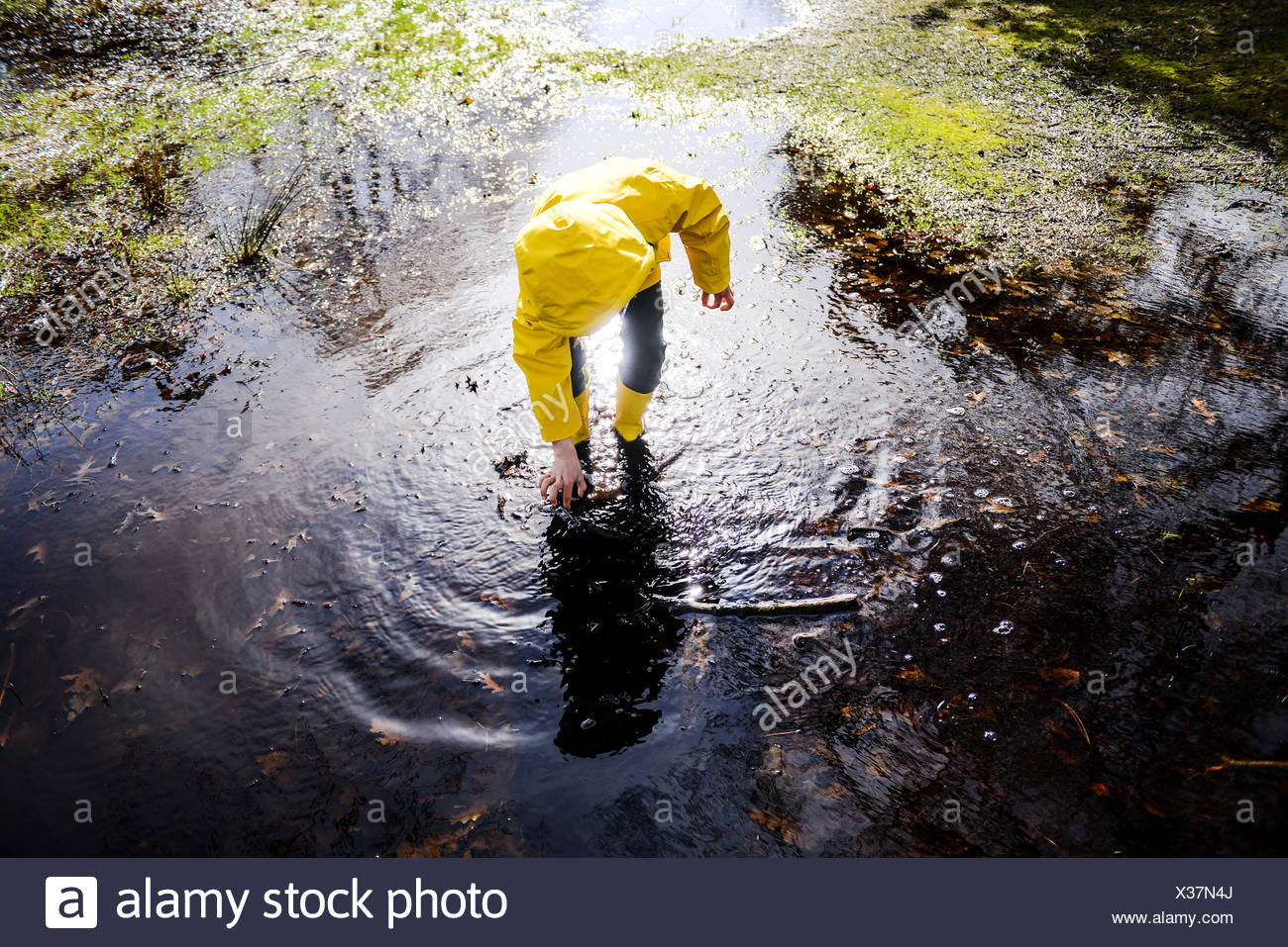 Boy In Puddle High Resolution Stock Photography and Images - Alamy