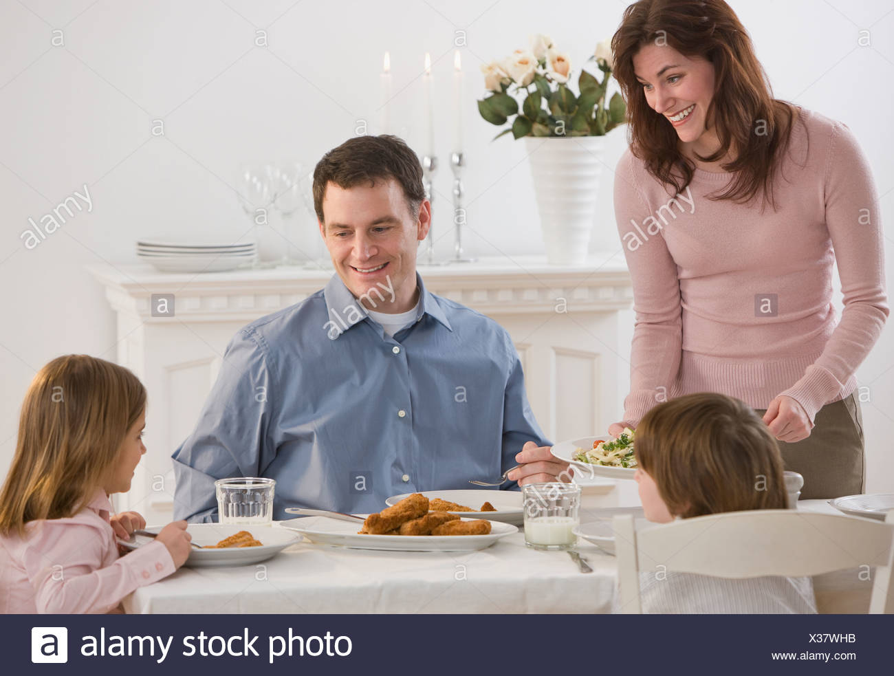 Two Girls Eating Dinner High Resolution Stock Photography and Images ...