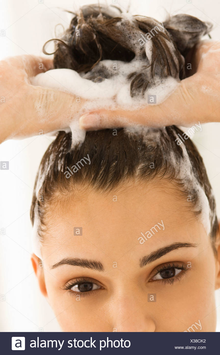 Woman Shampooing Her Hair Stock Photos & Woman Shampooing Her Hair ...