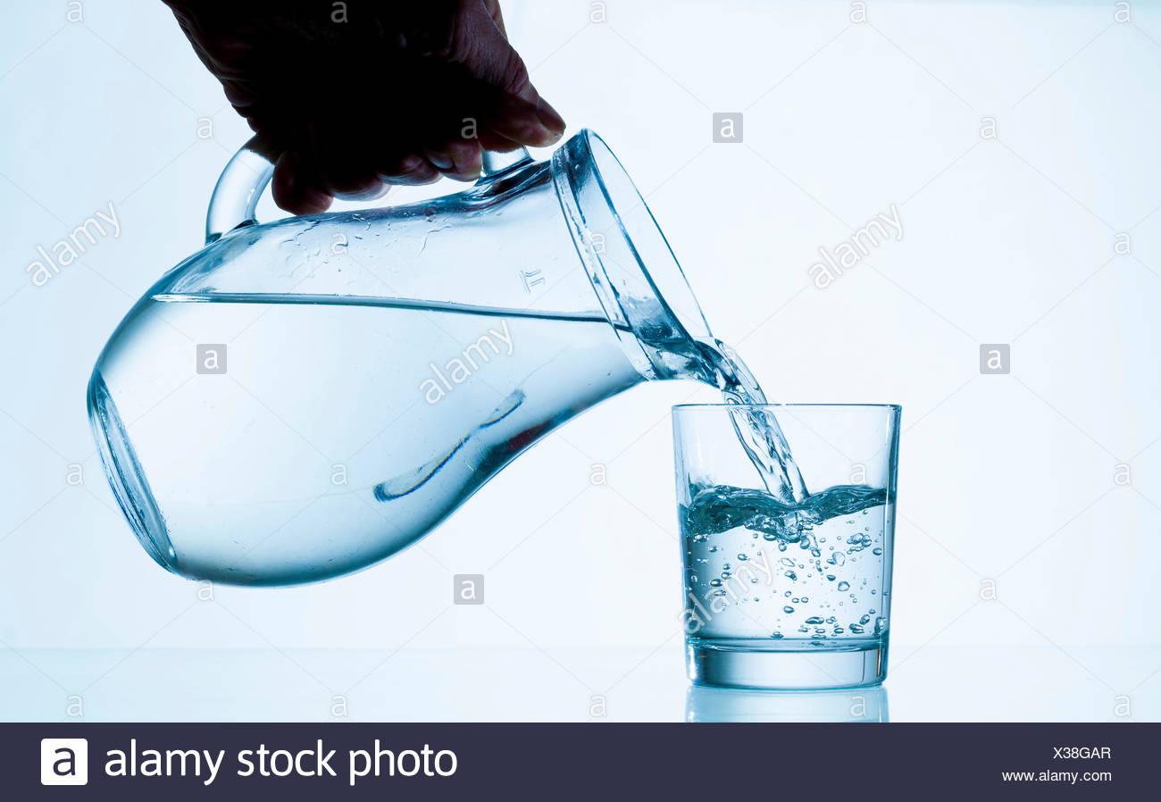 Jug Pouring Water Glass High Resolution Stock Photography and Images ...